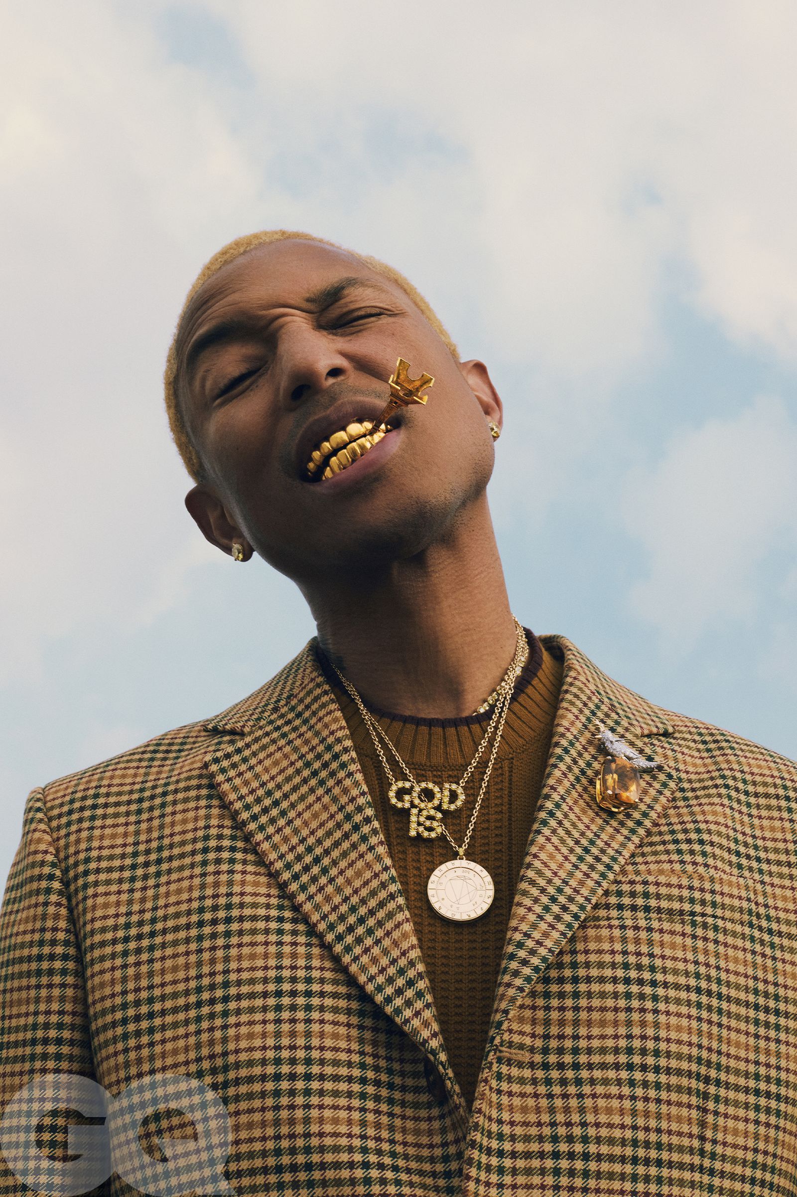 Pharrell Williams Teeth: The $100K Gold & Diamond Smile Secrets Revealed