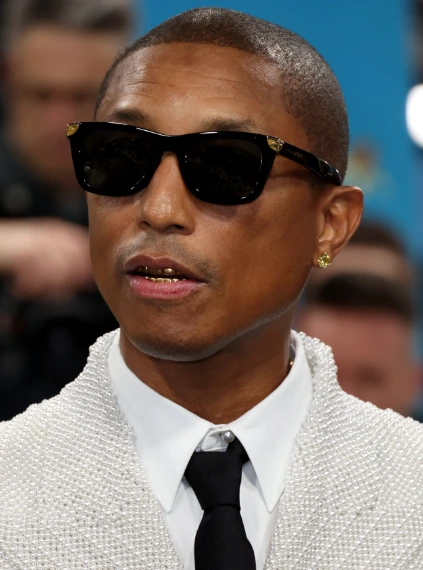 Pharrell Williams Teeth: The $100K Gold & Diamond Smile Secrets Revealed