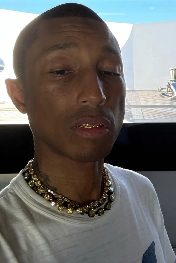 Pharrell Williams Teeth: The $100K Gold & Diamond Smile Secrets Revealed